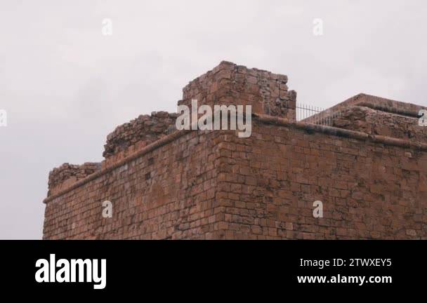 Side view of top of fortress. Side view of towers of fortress. Ruined ...
