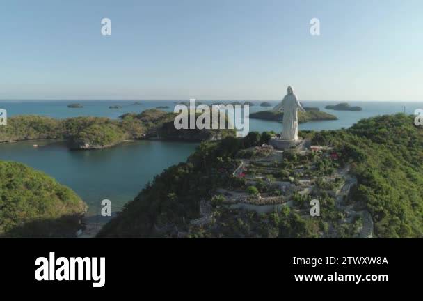 Statue of Jesus Christ on Pilgrimage island in Hundred Islands National ...