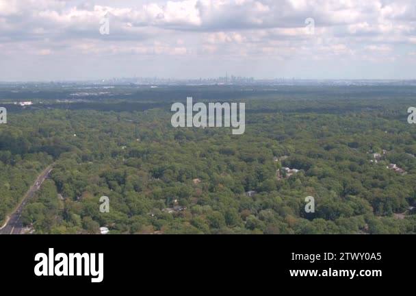 AERIAL ESTABLISHING SHOT: Flying above the luxury real estate houses ...
