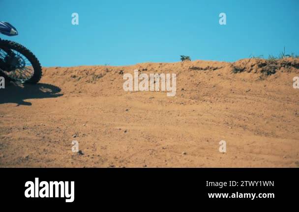 Pilot of an FMX bike is performing a sharp turn Stock Video Footage - Alamy