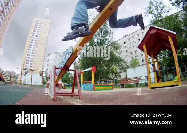 Girl and boy on teeterboard Stock Video Footage - Alamy