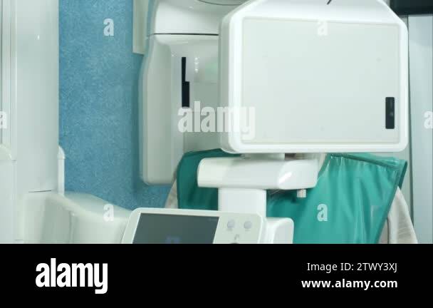 Senior patient doing examination of teeth by using panoramic and ...