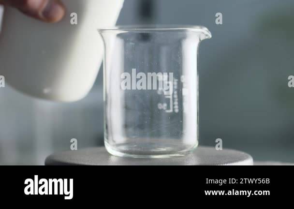 Laboratory experiments. Milk testing. Reagent and milk mixing reaction ...