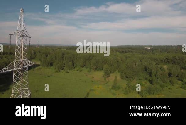Top view, AERIAL: power lines. Electric high-voltage supports ...
