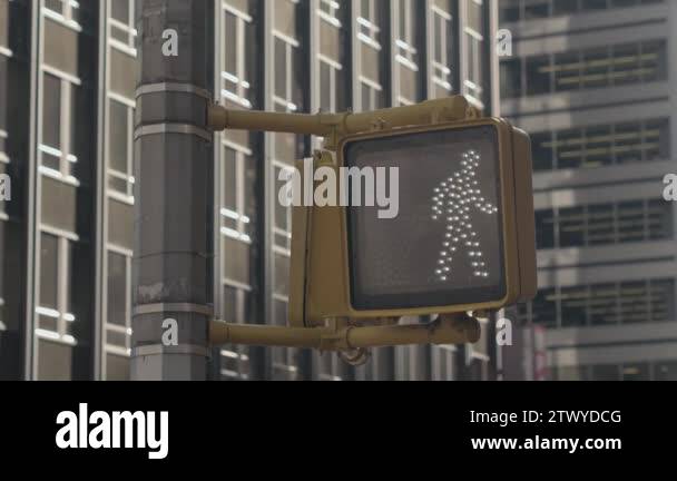 CLOSE UP: Detail of pedestrian crossing lights in New York City turning ...