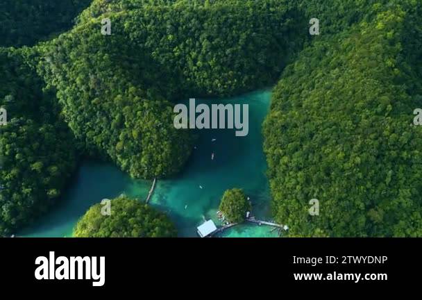 Tropical landscape rainforest hills and azure water in lagoon with ...