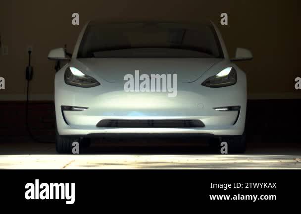 A brand new white Tesla Model 3. The model 3 is set to be the Teslas ...