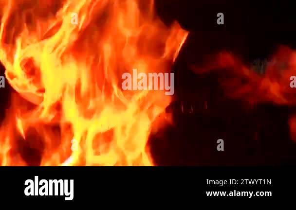 Bright and dangerous fire. Flames of fire and black smoke. Strong fire ...