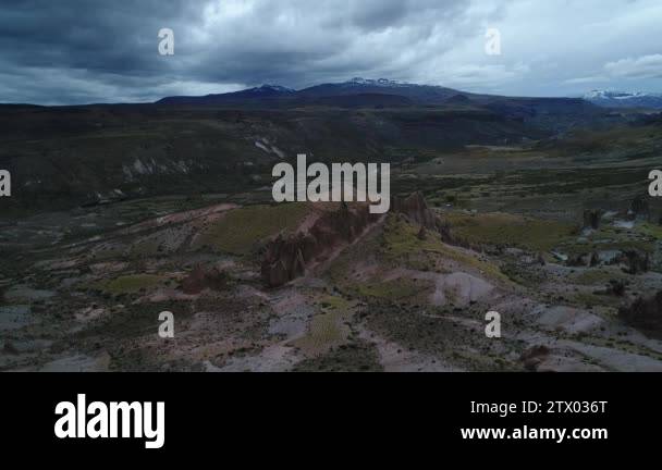 Los Bolillos red eroded rock formation on mountain slides of Varvarco ...