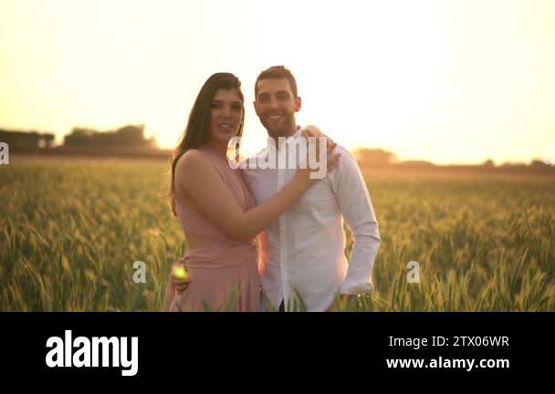 Romantic Couple on a Love Moment at gold wheat flied - Portrait ...