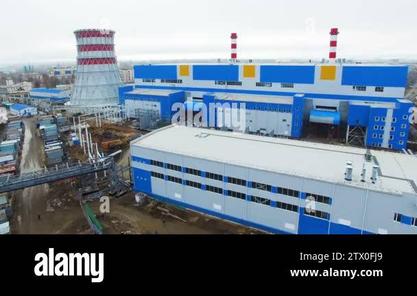 Panorama people walk along thermal power plant territory past ...