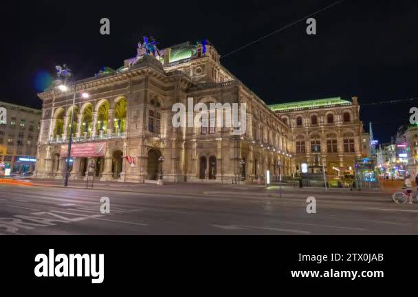 vienna city night illuminated famous opera house traffic street ...