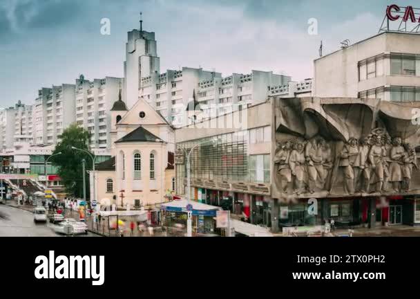Minsk, Belarus. Traffic Near Cathedral Of Saints Peter And Paul And Bas ...