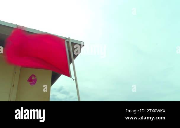 Hazard flag Stock Videos & Footage - HD and 4K Video Clips - Alamy