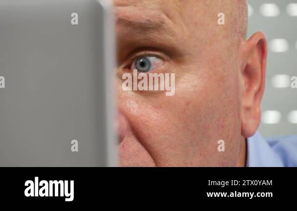 Close Up Astonished Face of a Troubled Businessman Looking to Computer ...