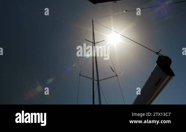 4K Sail Fills with Wind, Sailing in Summer Sun, Sunlight Lens Flare ...