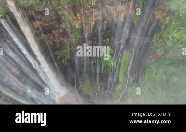 The nature of Indonesia. The island of Java. Waterfall Coban Sewu ...
