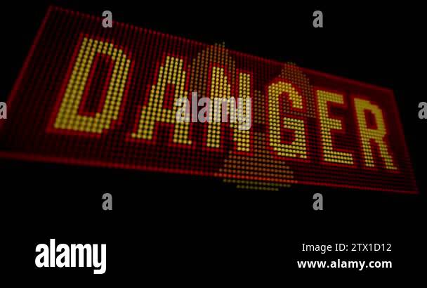 Danger radiation alert on big LED display with large pixels. Bright ...
