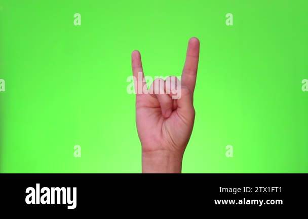 Sign of the horns. A "rock on" hand gesture. Heavy Metal. Chromakey ...