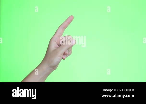 A man raising hand and finger to answer a question. Hand close-up ...