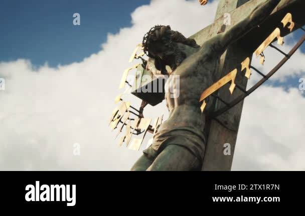 Crucifixion. Christian cross with Jesus Christ statue over stormy clouds time lapse. 1920x1080 ...