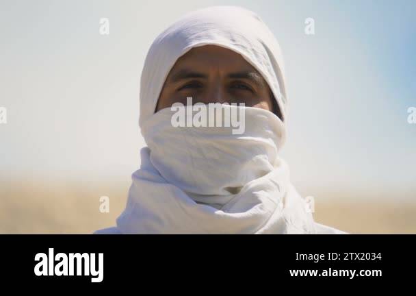 Portrait of man muslim hiding face under white clothing, islamic ...