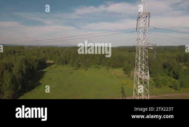 Top view, AERIAL: power lines. Electric high-voltage supports ...