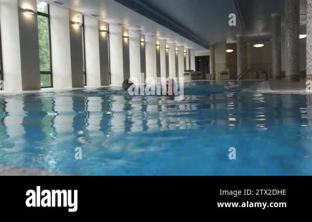 Swimming in hotel indoor swimming pool Stock Videos & Footage - HD and ...