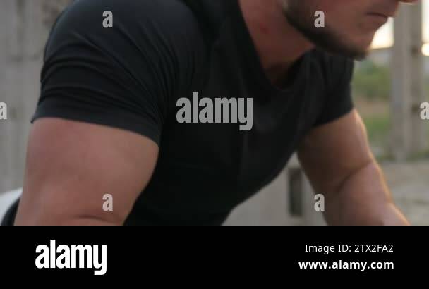 Close up shot of young muscular guy doing push-ups. Sport man, fitness ...