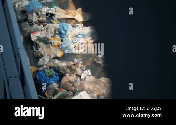 Recycling factory with conveyors. Sorting garbage equipment working at ...