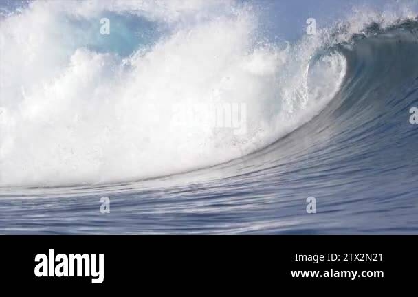 SLOW MOTION, CLOSE UP, DOF: Beautiful big barrel wave sparkling in the ...