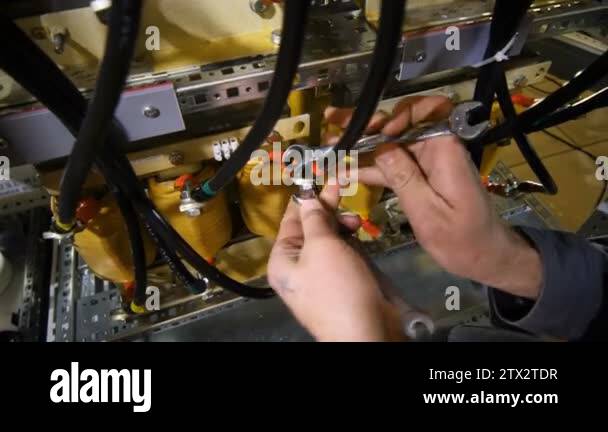 worker mounts distribution board dividing electrical power feed Stock ...