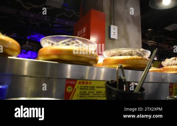 Conveyor belt for serve Chinese hot pot Sichuan style or Shabu-shabu ...