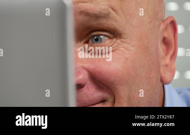 Close Up Businessman Face in Front of PC Monitor Smiling Satisfied ...