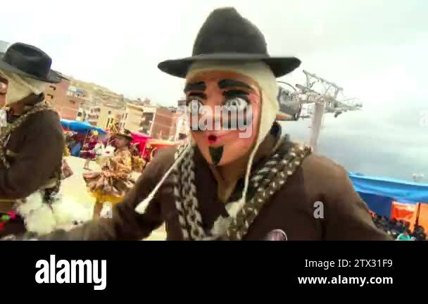 Oruro village carnival parade ceremonial dancing. Colorful Bolivian ...