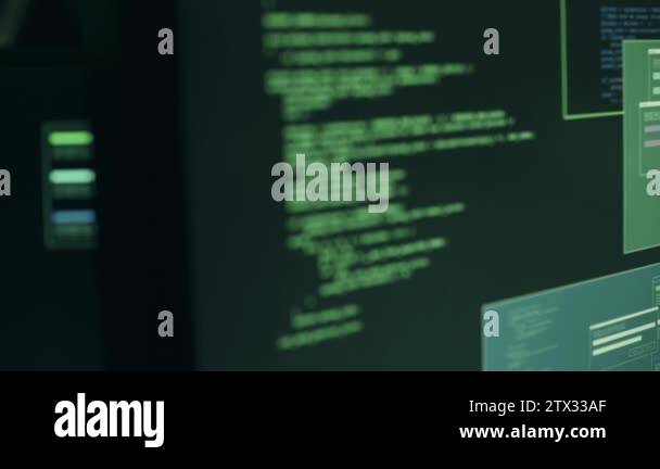 Developer and hacker hidden workstation: multiple screens and connected computers on a desktop ...