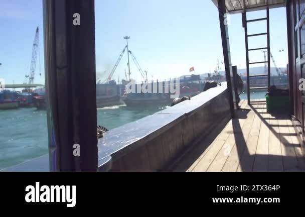 Ship sailing in sea port. View from board sailing ship on passenger ...