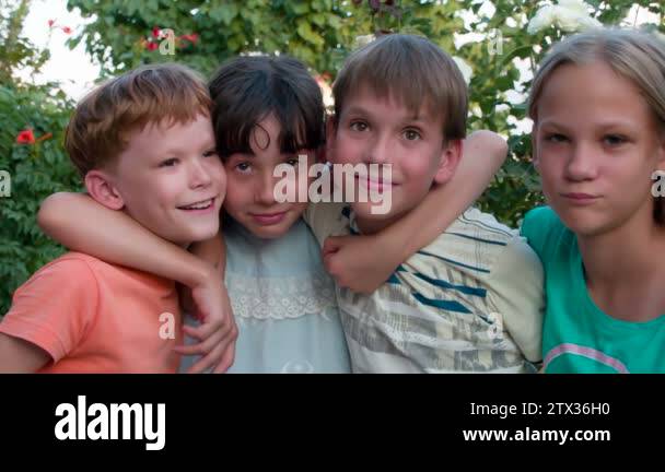 Four friends hugging Stock Videos & Footage - HD and 4K Video Clips - Alamy