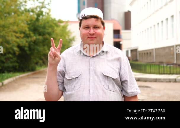 Muslim peace sign Stock Videos & Footage - HD and 4K Video Clips - Alamy