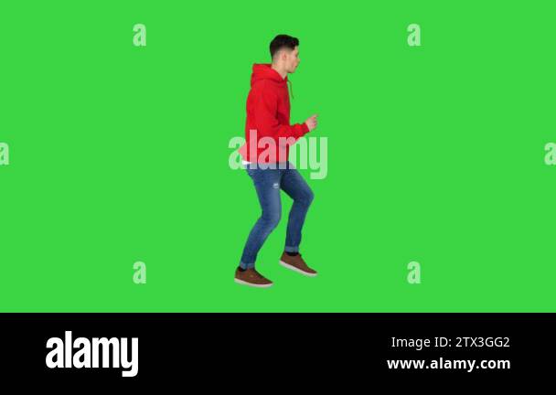 Young hip-hop man break dancing Top break dance on a Green Screen ...