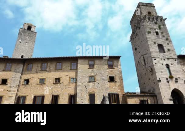 Panoramic view of medieval building and towers, San Gimignano, Tuscany ...