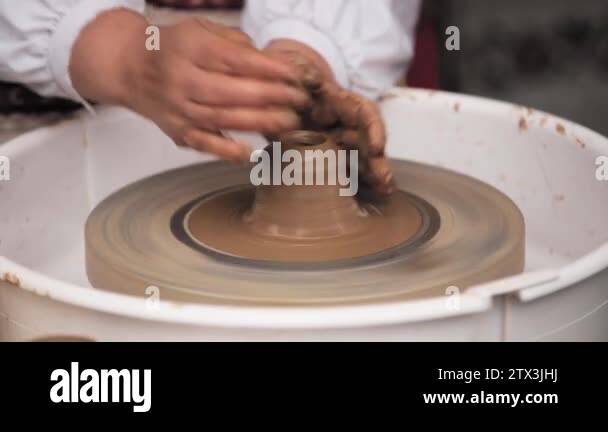 Process Of Creating A Clay Pot. Using Hands. Pottery Craft Wheel And ...