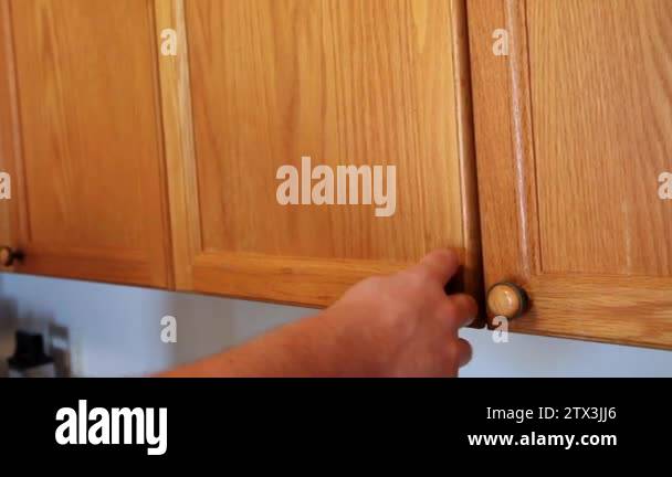 Reaching into cupboard Stock Videos & Footage - HD and 4K Video Clips ...