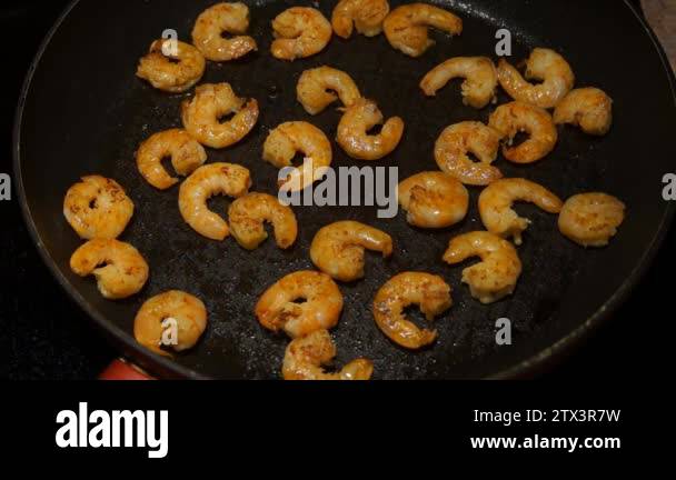 Cooking shrimp. Man frying shrimp. Chef cooking shrimp Stock Video ...