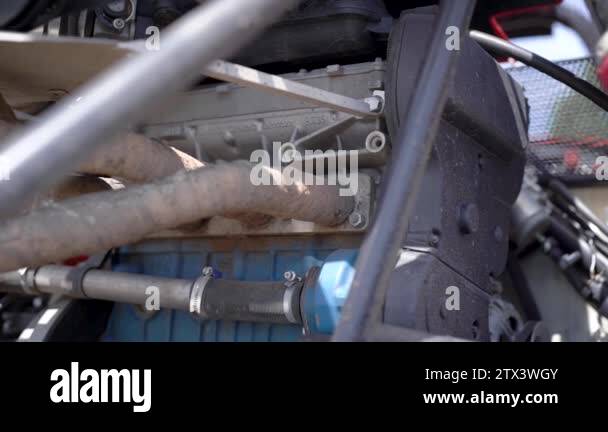 The buggy engine, gearbox, and exhaust manifold are located at the rear ...
