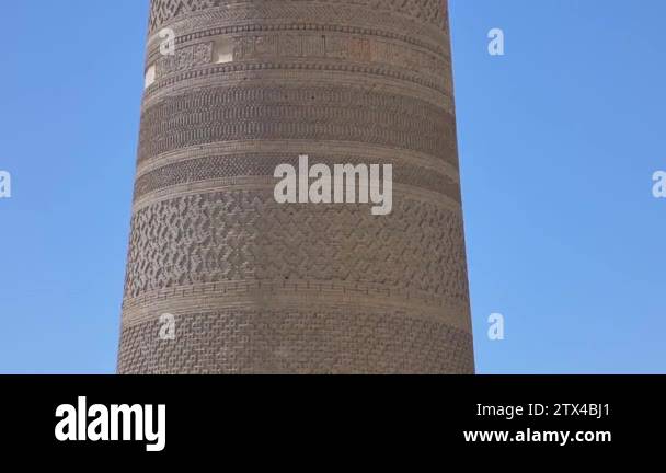 High oval tower of bricks, ancient Asian buildings. the details of the ...