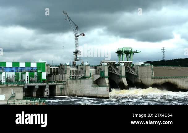 Hydroelectric power station under construction on the river. The open ...