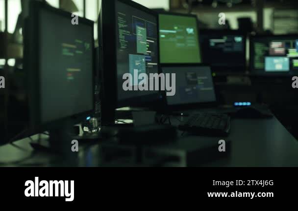 Developer and hacker hidden workstation, multiple screens and connected computers: cyber ...