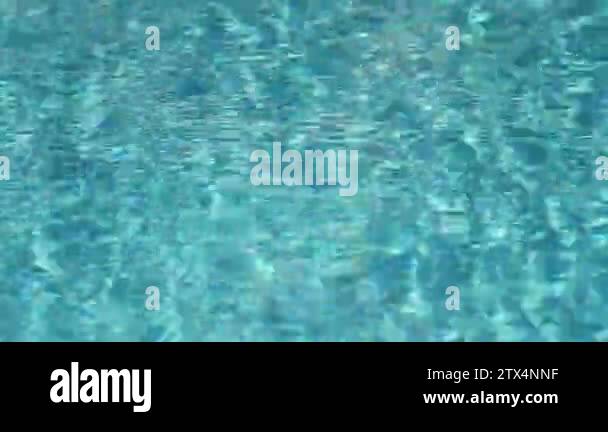 Refraction of sunlight in swimming pool water Stock Video Footage - Alamy