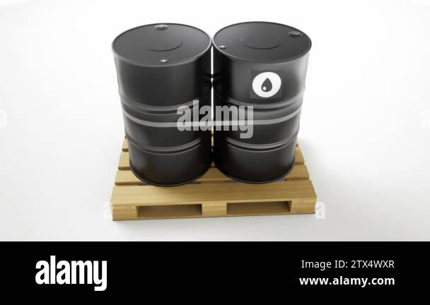 Two metal black barrels with oil symbol located on wooden pallet ...
